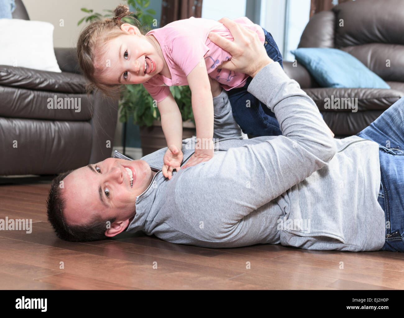 family, child and home concept Stock Photo - Alamy