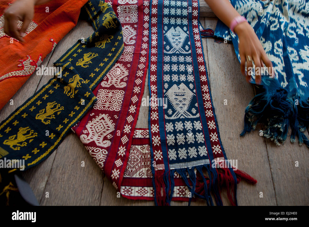 Women selling woven textile products as a traditional source of ...
