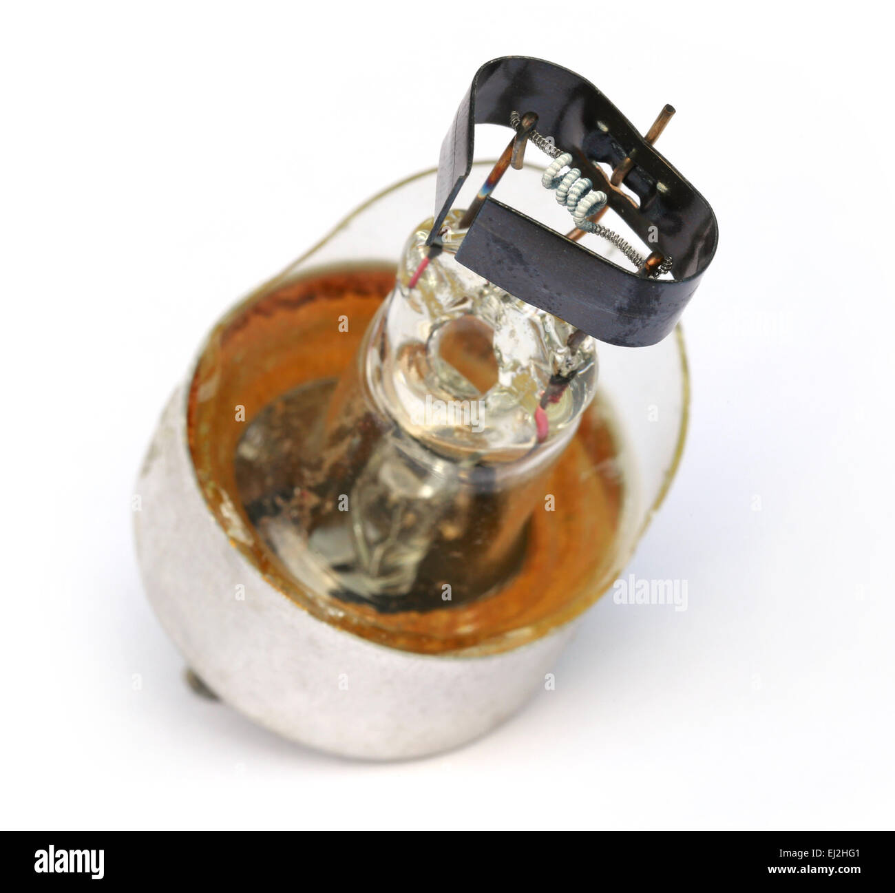 Broken light bulb over white background Stock Photo - Alamy