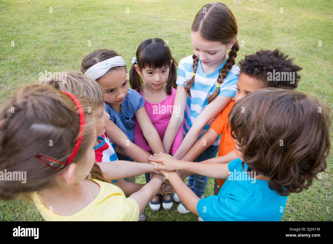 Children hands together hi-res stock photography and images - Alamy
