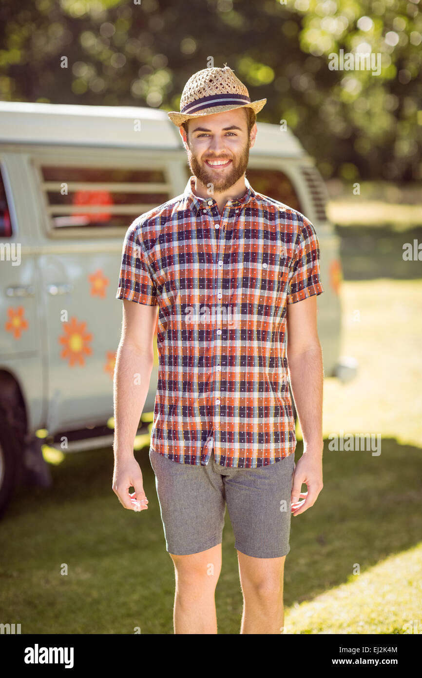 Handsome hipster smiling at camera Stock Photo - Alamy