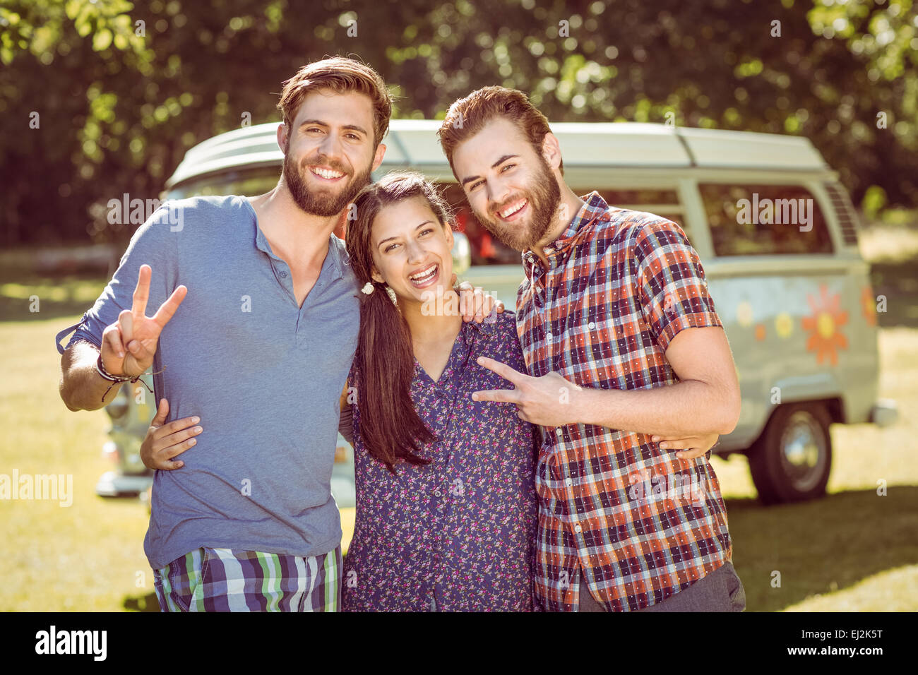 Hipster friends smiling at camera Stock Photo - Alamy