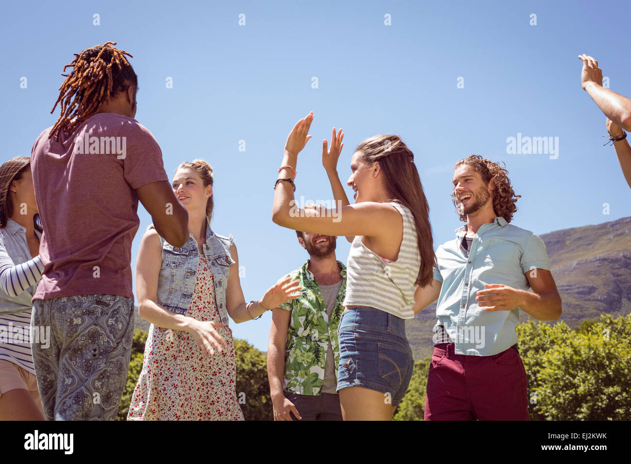 Young hipster friends dancing together Stock Photo - Alamy