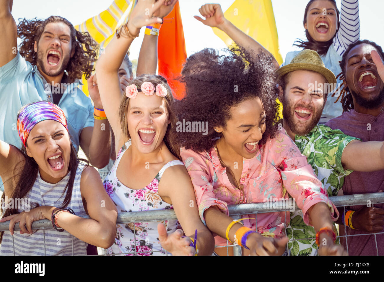 Excited young people singing along Stock Photo - Alamy