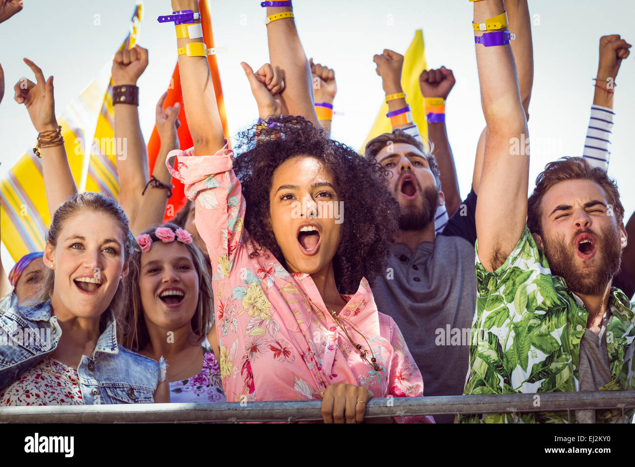 Excited young people singing along Stock Photo - Alamy