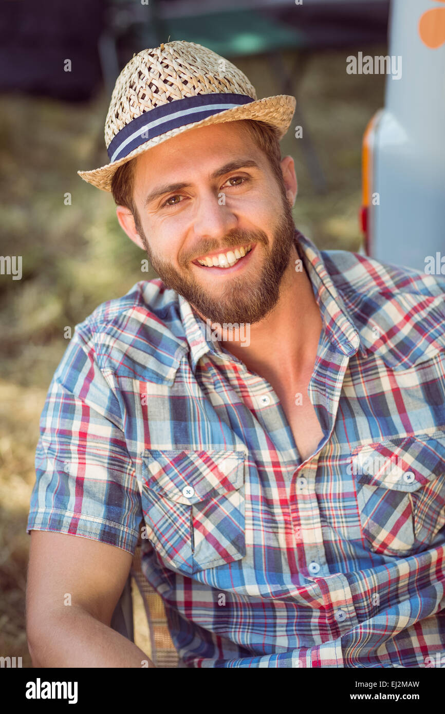 Handsome hipster smiling at camera Stock Photo - Alamy