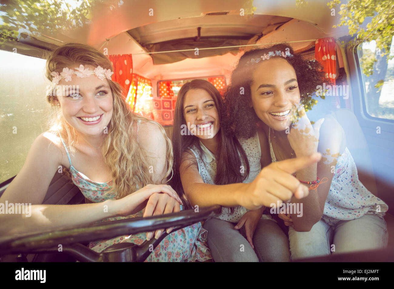 Hipster friends on road trip Stock Photo - Alamy