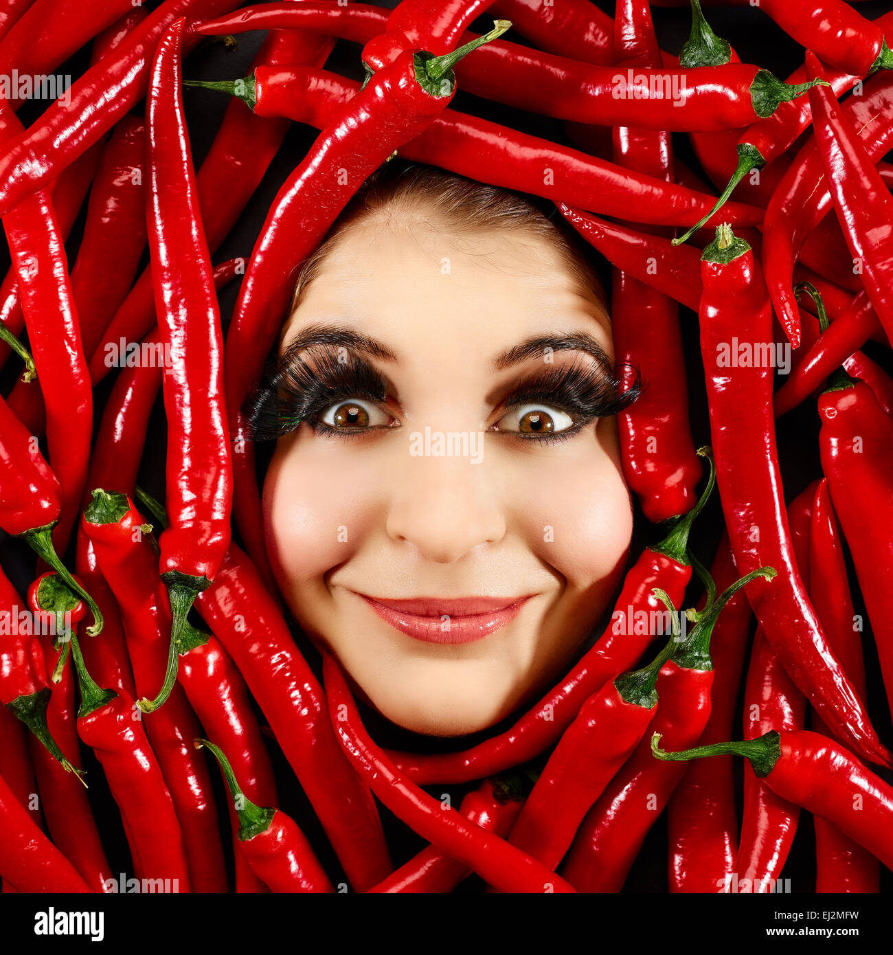 Beautiful woman expression face with red chili pepper frame Stock Photo ...
