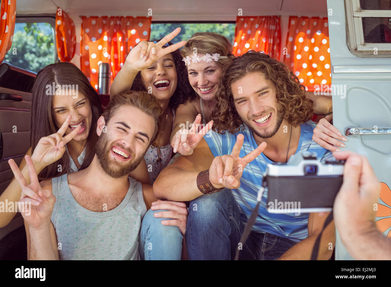 Happy friends gathering camper van hi-res stock photography and images ...
