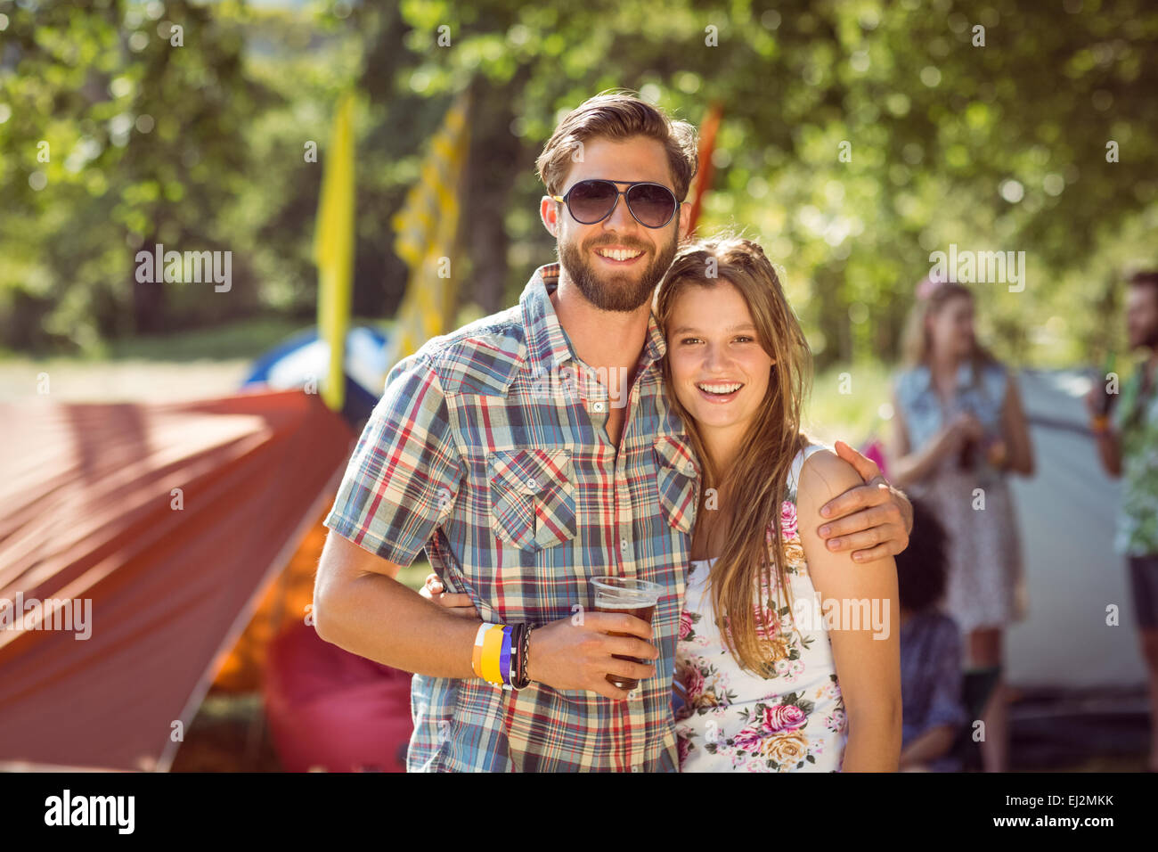 Hipster friends chatting on campsite Stock Photo - Alamy
