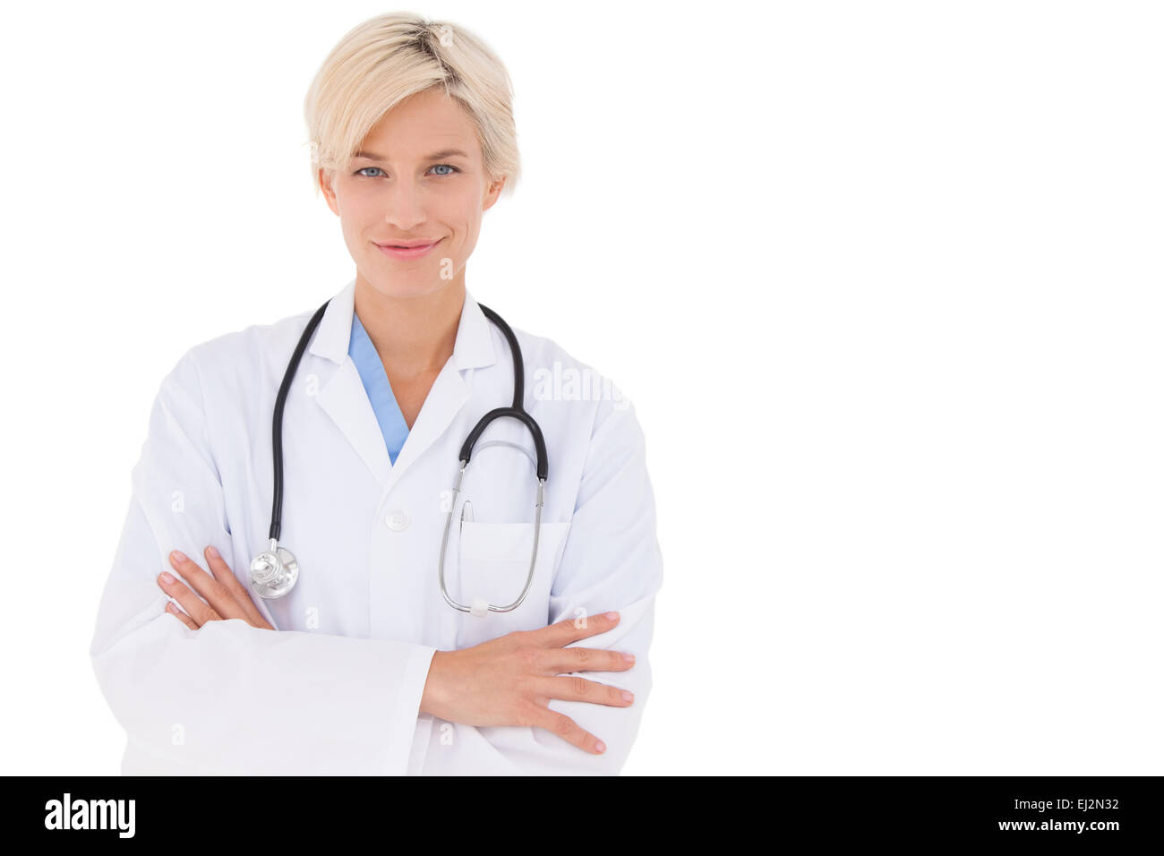 Blonde doctor smiling at camera Stock Photo - Alamy
