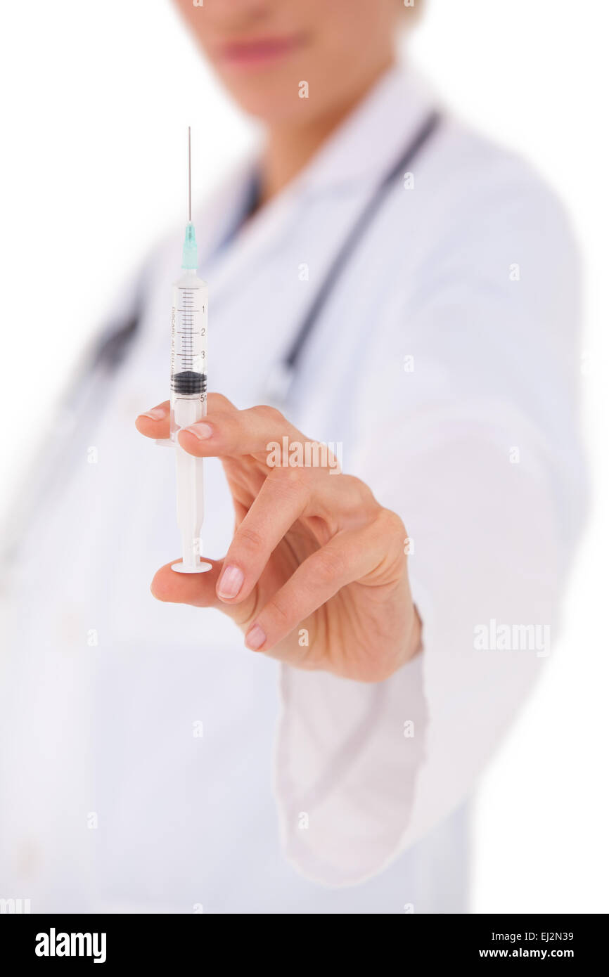 Doctor showing syringe to camera Stock Photo - Alamy