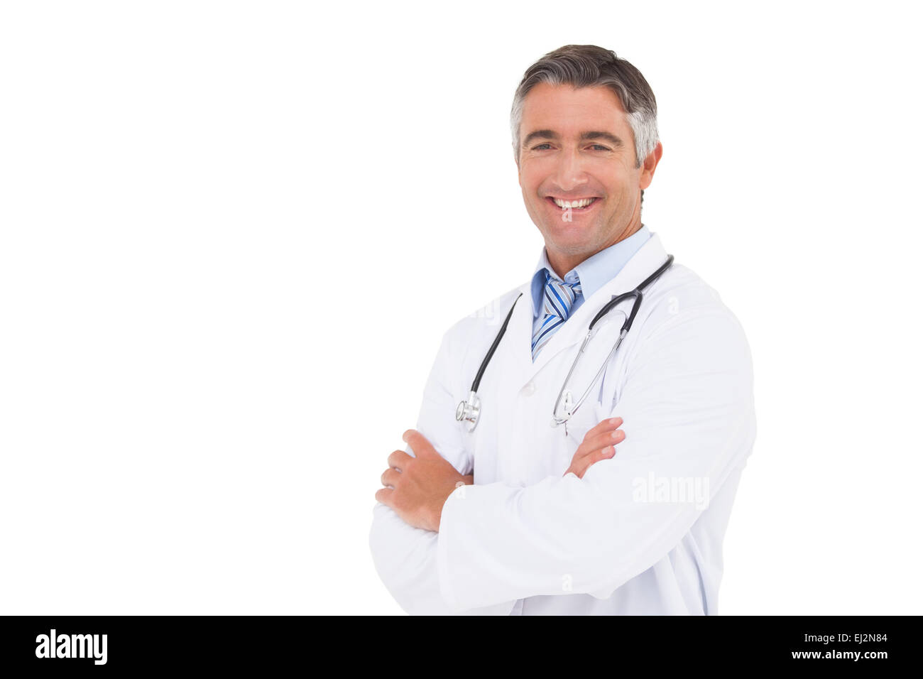 Happy doctor smiling at camera Stock Photo - Alamy