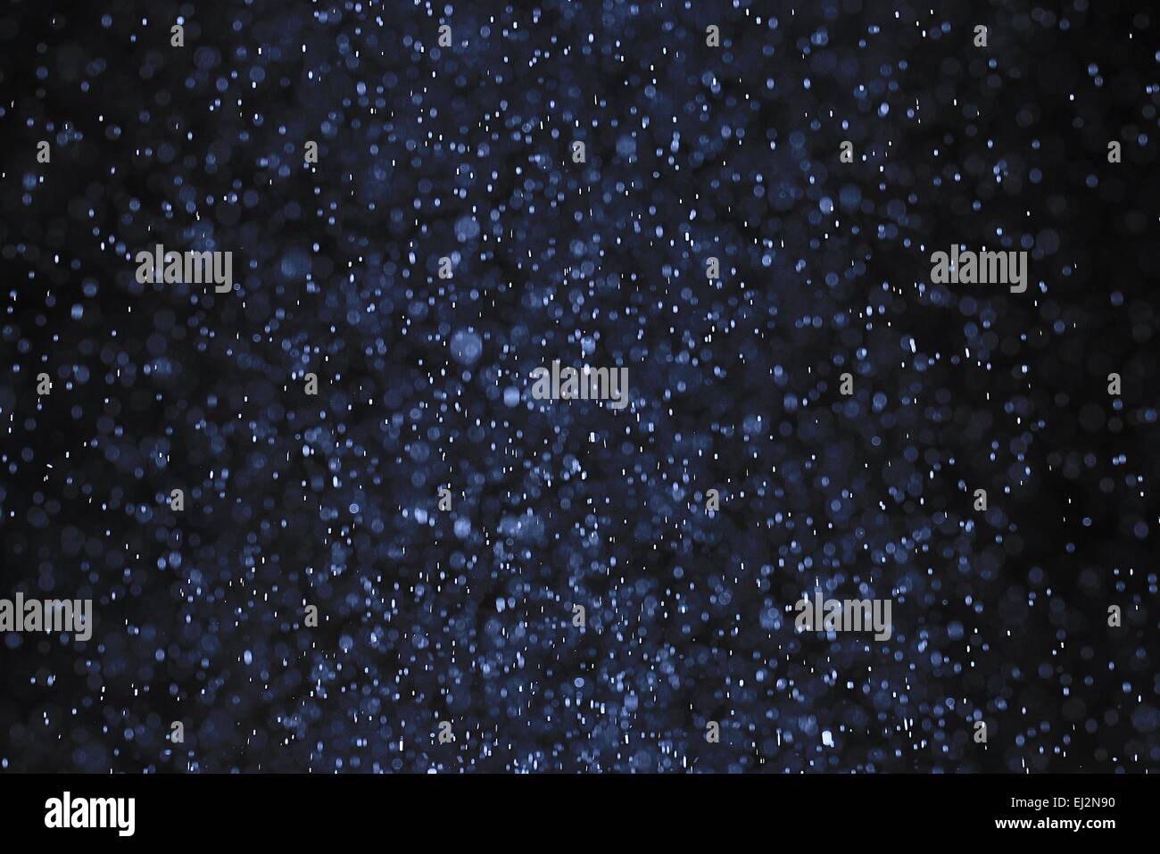 snow rain on a black background texture overlay Stock Photo - Alamy