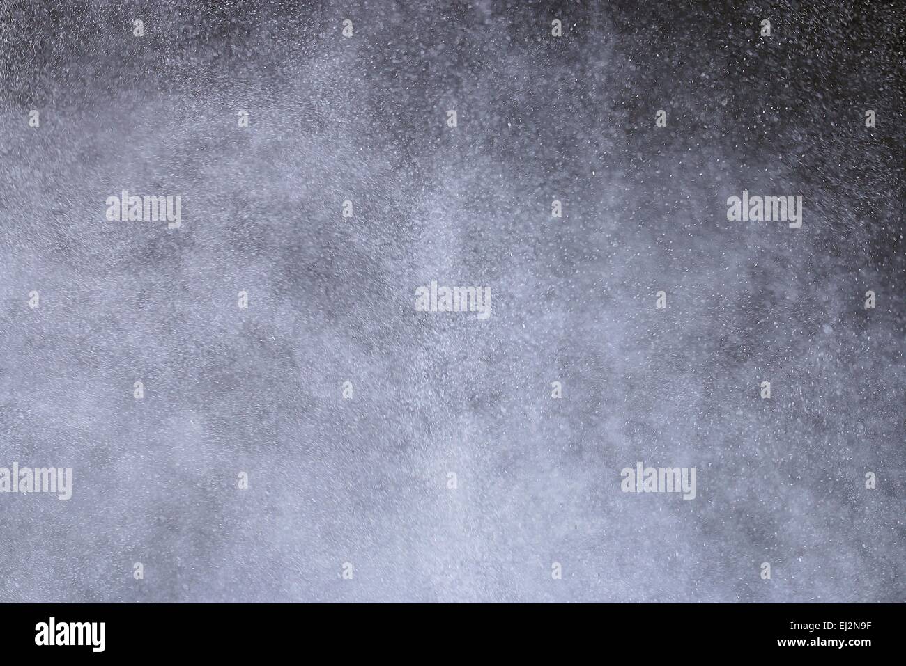 spray from the atomizer spray on black background overlay Stock Photo ...