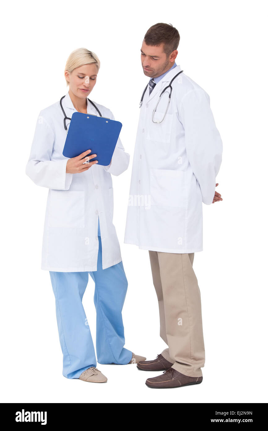 Male female colleagues discussing Cut Out Stock Images & Pictures - Alamy