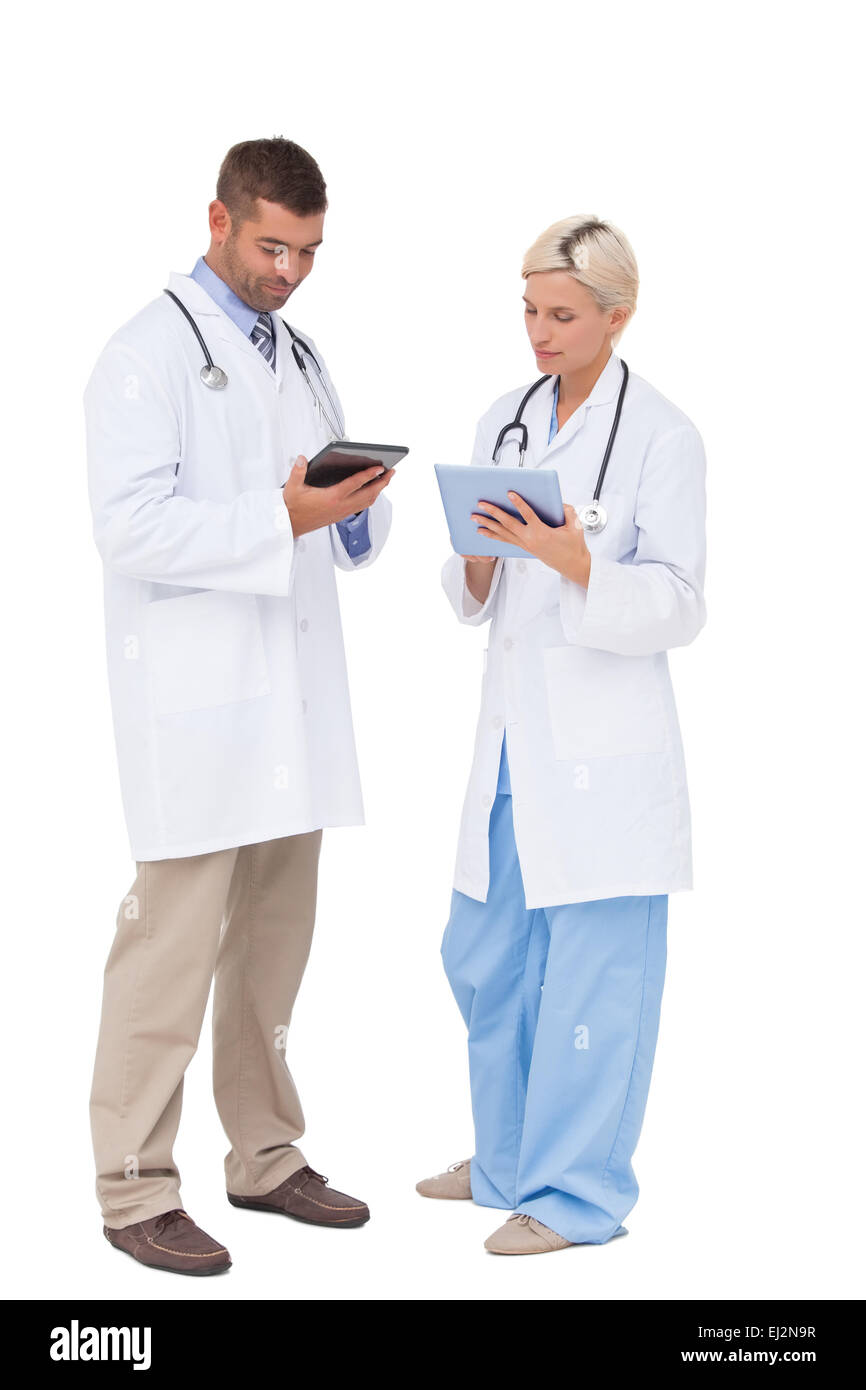 Male female colleagues discussing Cut Out Stock Images & Pictures - Alamy