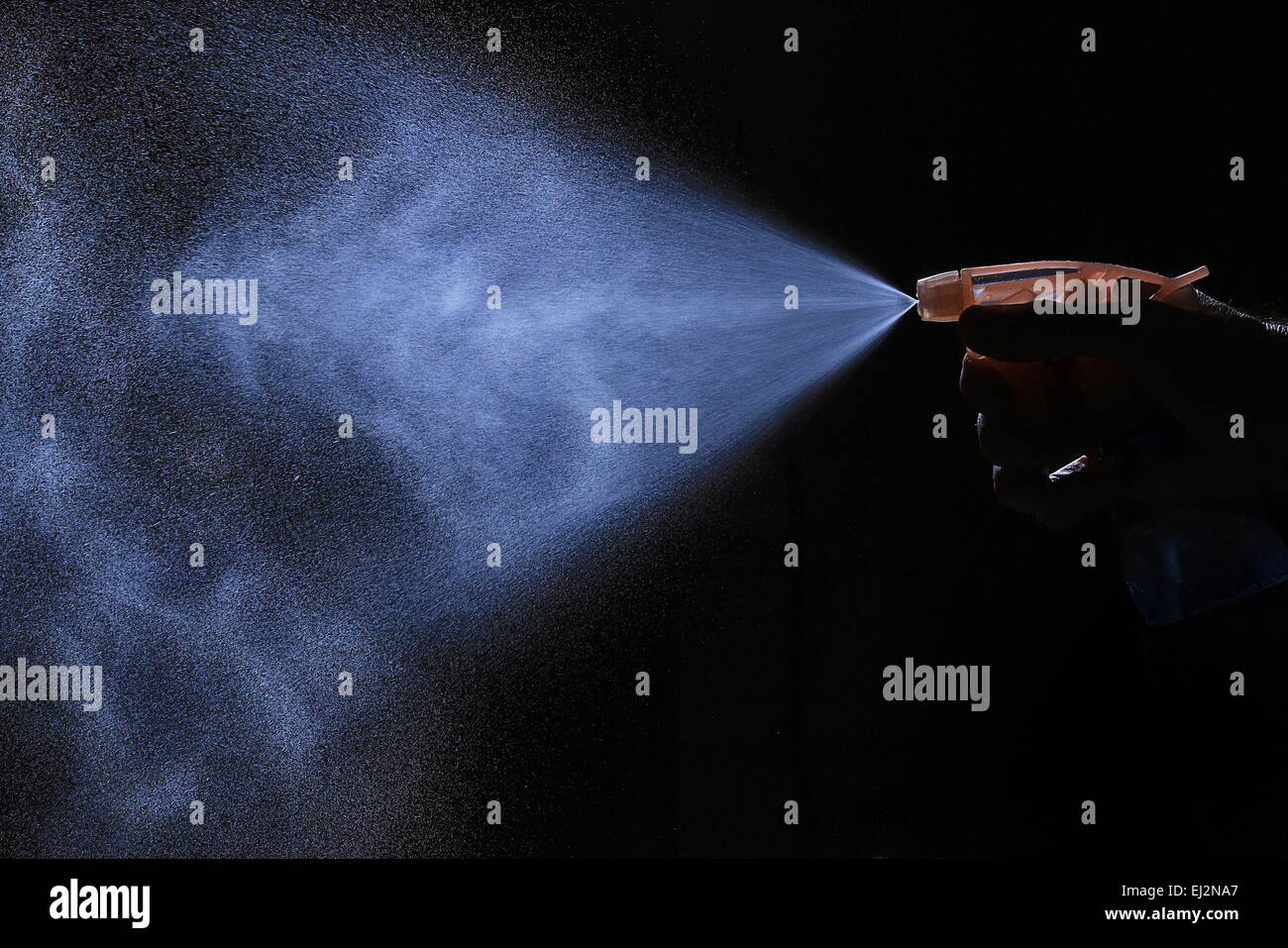 spray from the atomizer spray on black background overlay Stock Photo ...