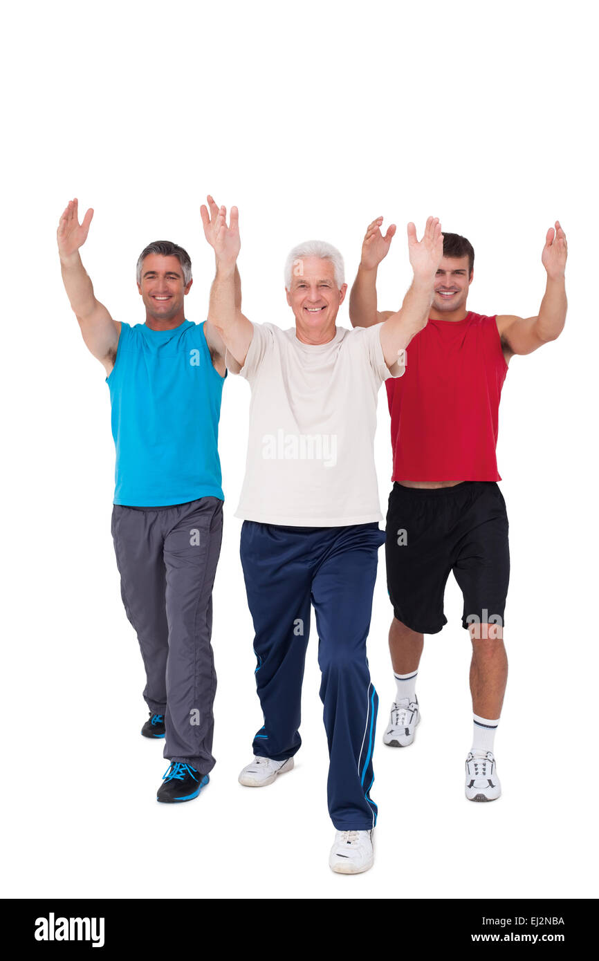 Fit men stretching their arms Stock Photo - Alamy