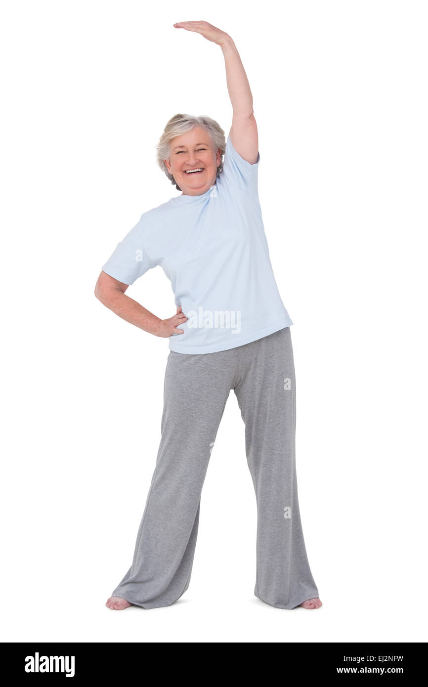 Senior woman stretching her arms Stock Photo - Alamy Senior woman stretching her arms Stock Photo - Alamy