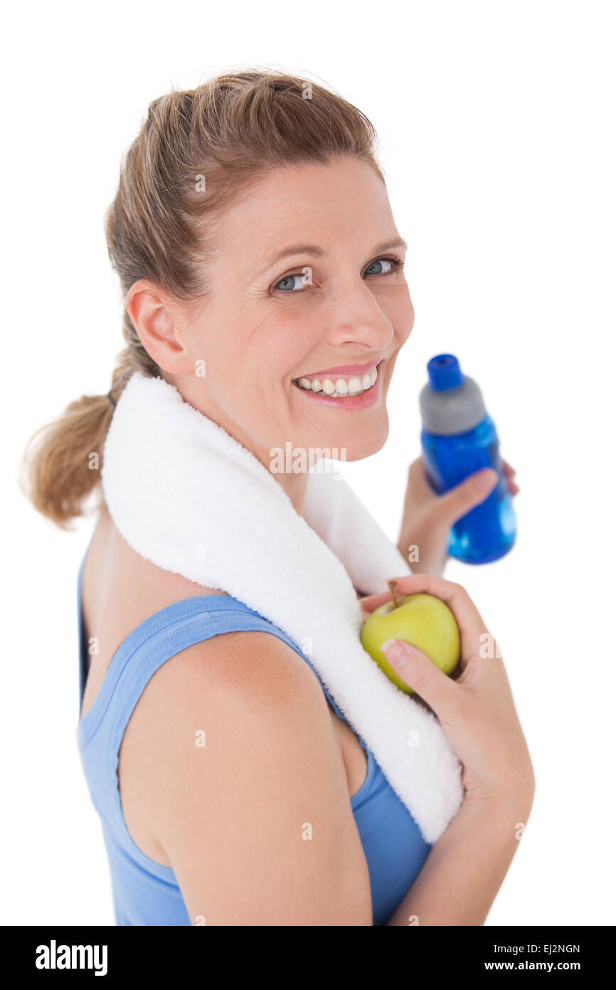 Fit woman smiling at camera Stock Photo - Alamy