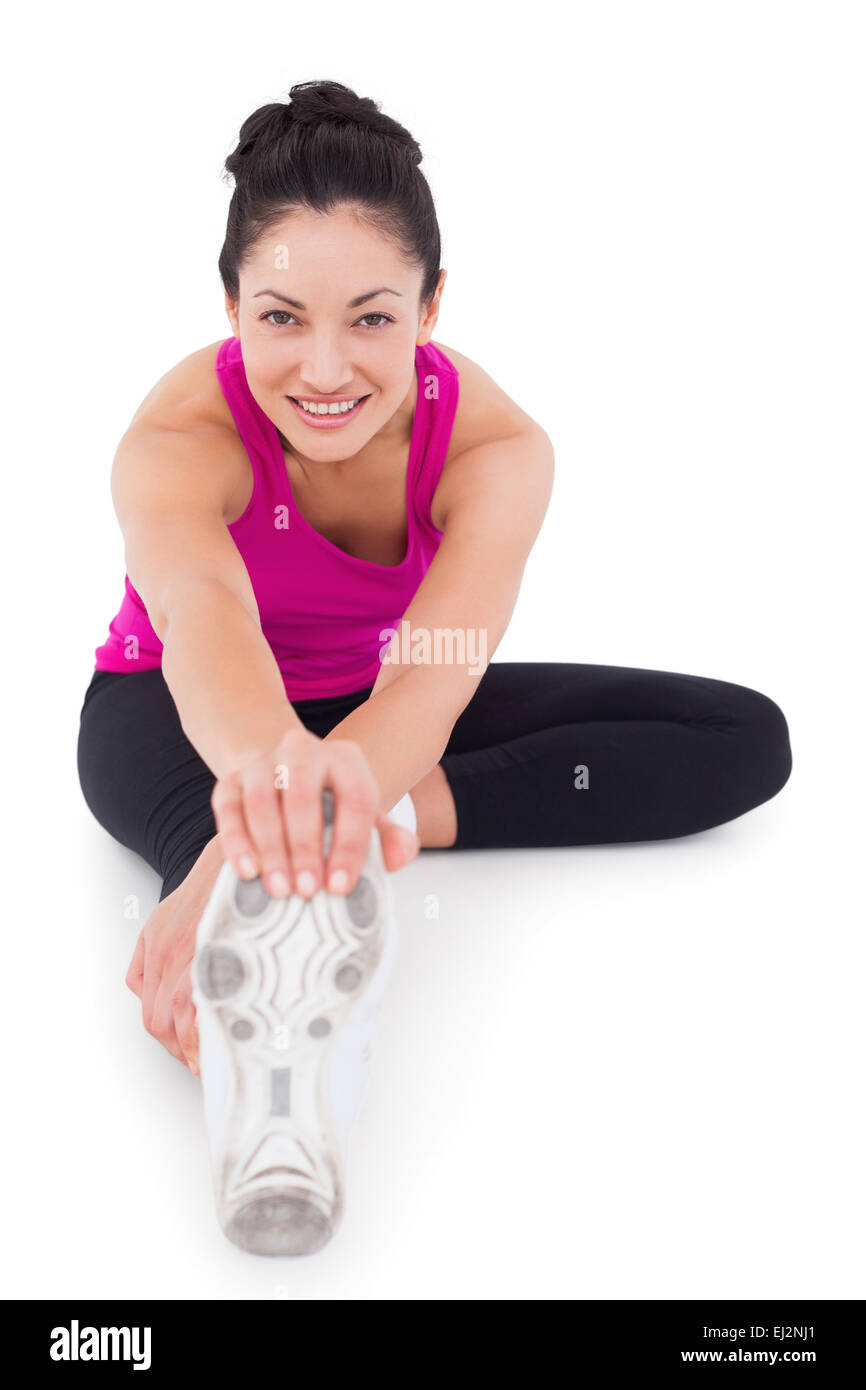 Fit woman stretching her leg Stock Photo - Alamy