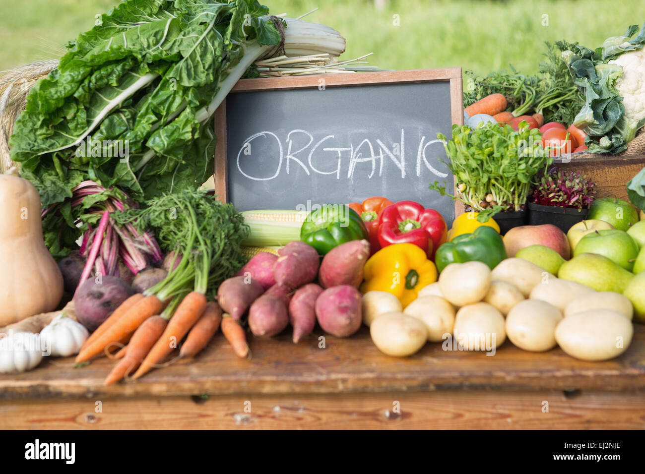 Table of fresh produce at market Stock Photo - Alamy