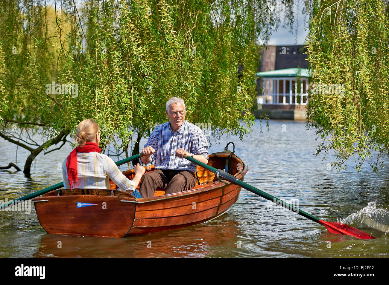 Man rowing rowboat hi-res stock photography and images - Alamy