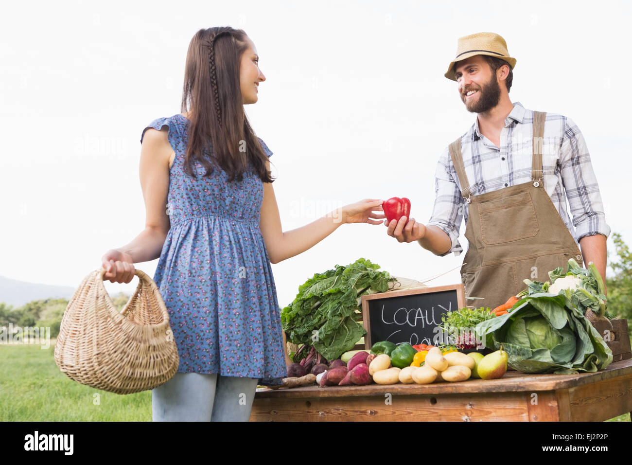 Farmer selling his organic produce Stock Photo - Alamy