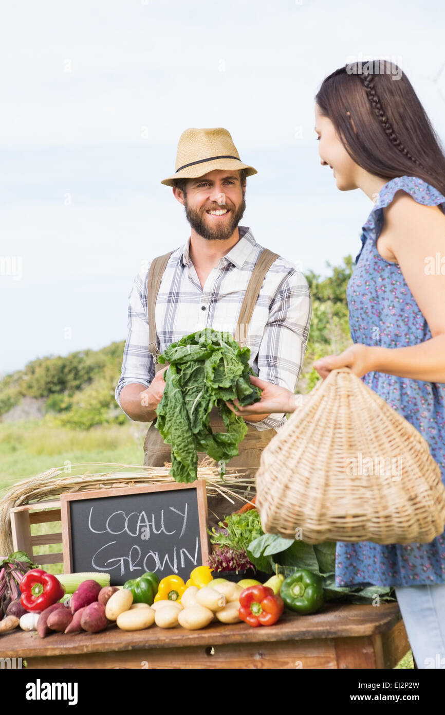Farmer selling his organic produce Stock Photo - Alamy