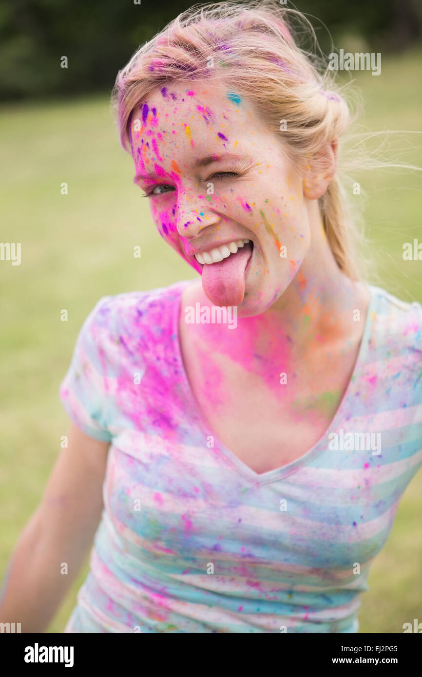 Young woman having fun with powder paint Stock Photo - Alamy