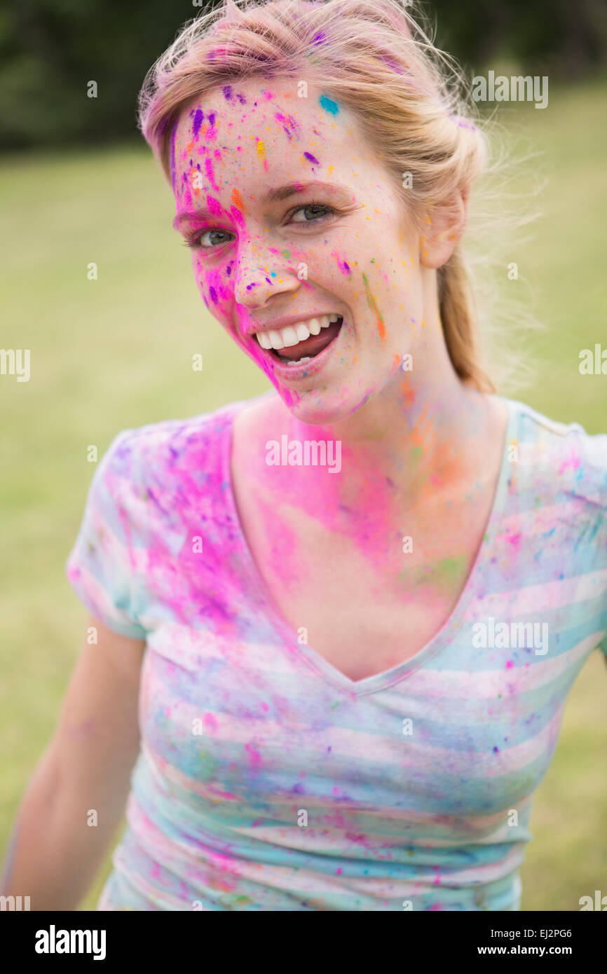 Young woman having fun with powder paint Stock Photo - Alamy