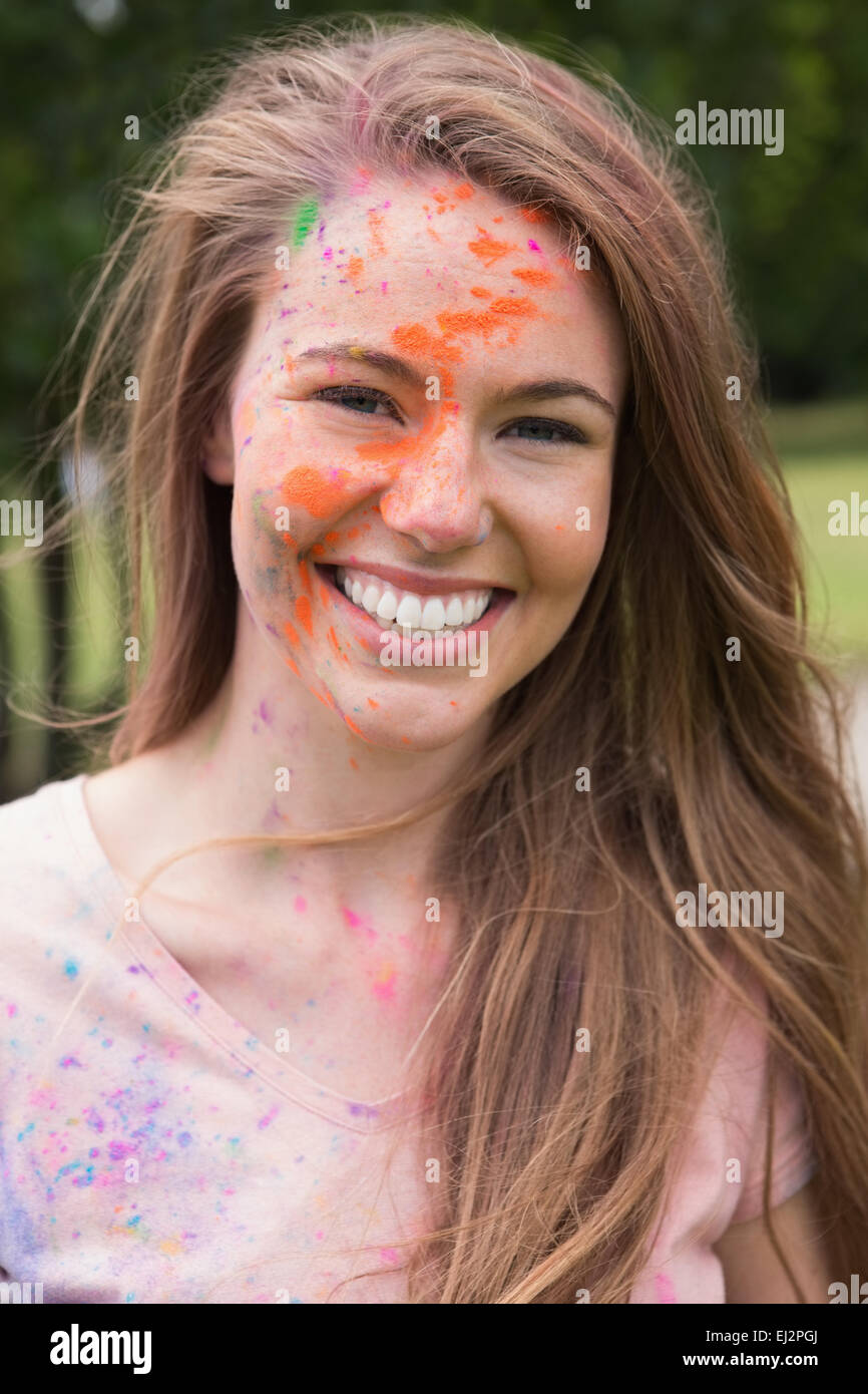 Young woman having fun with powder paint Stock Photo - Alamy