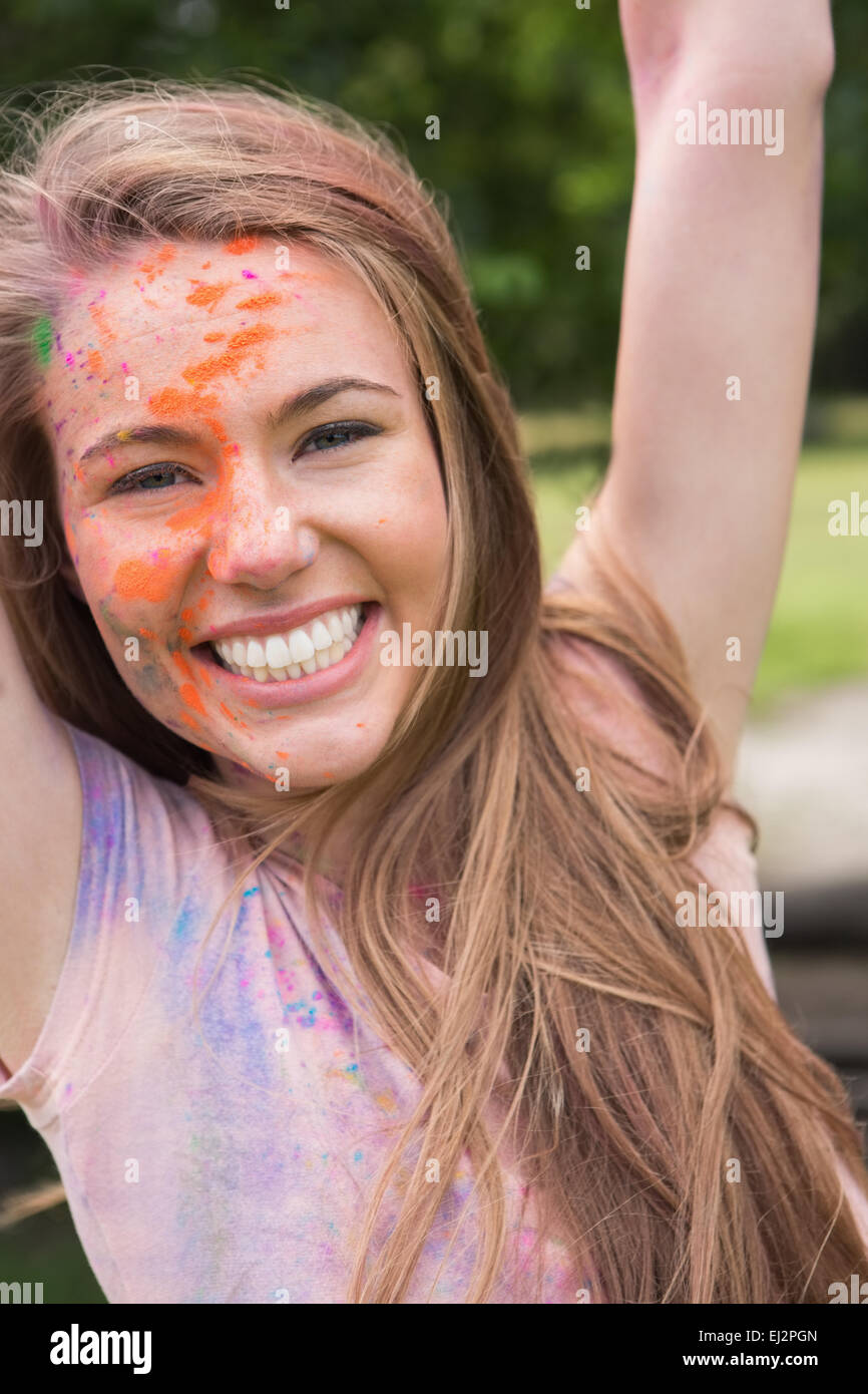 Young woman having fun with powder paint Stock Photo - Alamy