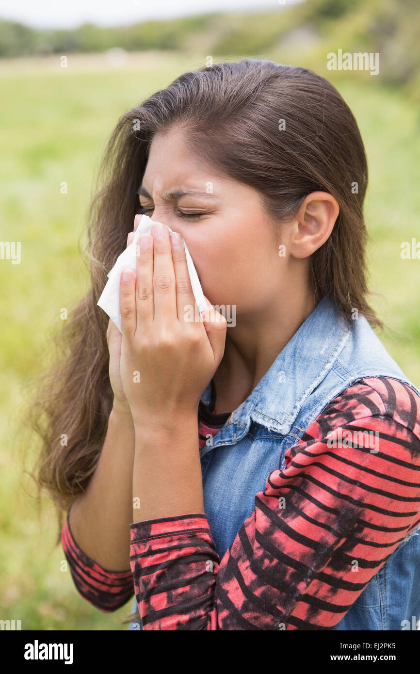 Woman outdoors blowing nose hi-res stock photography and images - Alamy