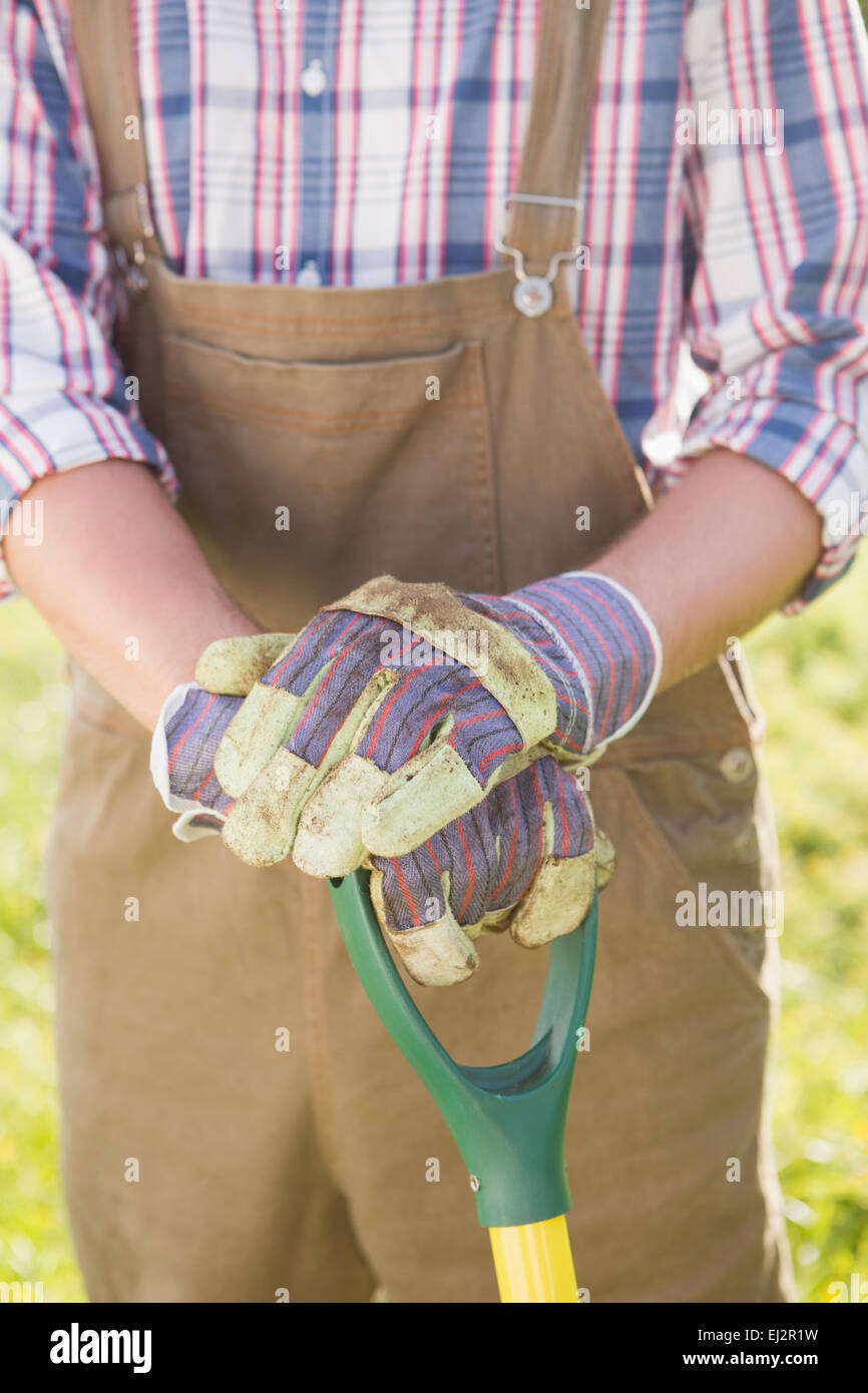 Happy farmer with his shovel Stock Photo - Alamy