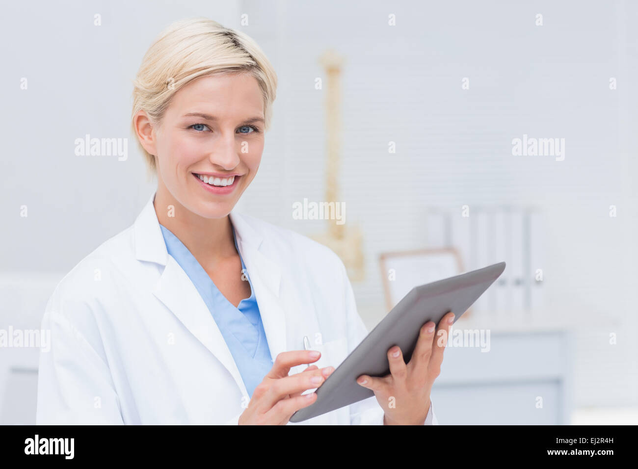 Young smart female doctor computer hi-res stock photography and images ...