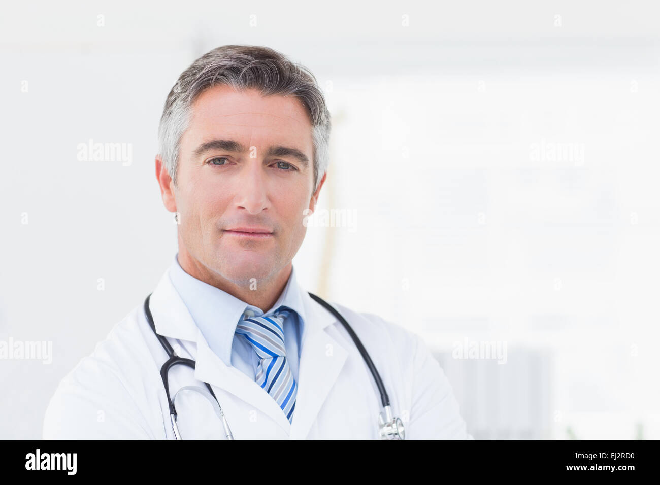 Portrait of confident doctor Stock Photo - Alamy