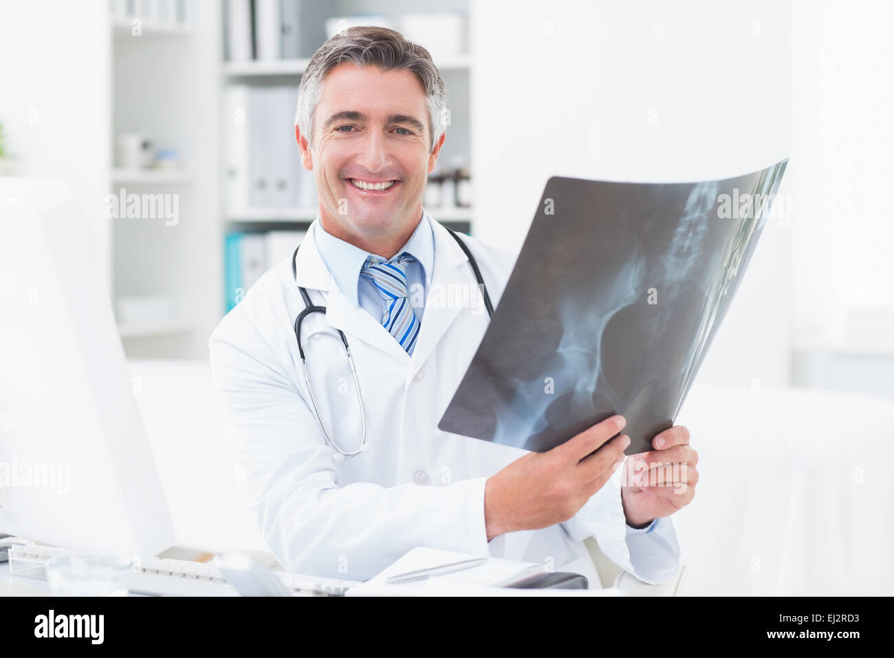 Doctor holding x ray hi-res stock photography and images - Alamy
