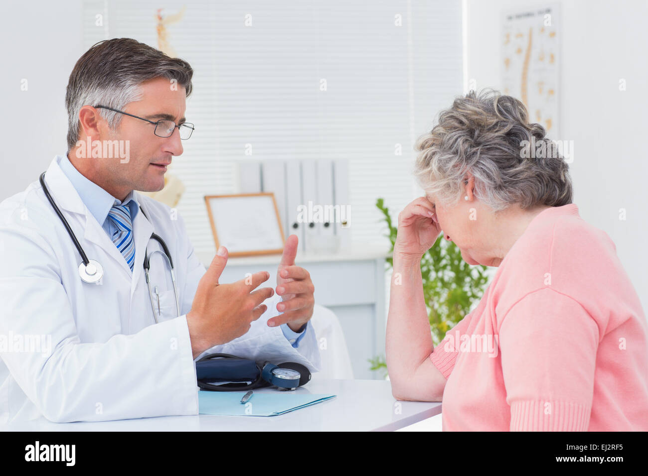 Worried doctor patient man hi-res stock photography and images - Alamy