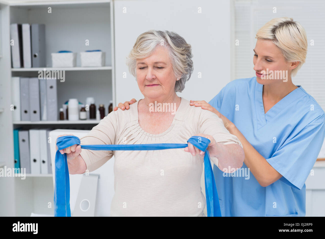 Physical therapy nurse patient exercising High Resolution Stock ...
