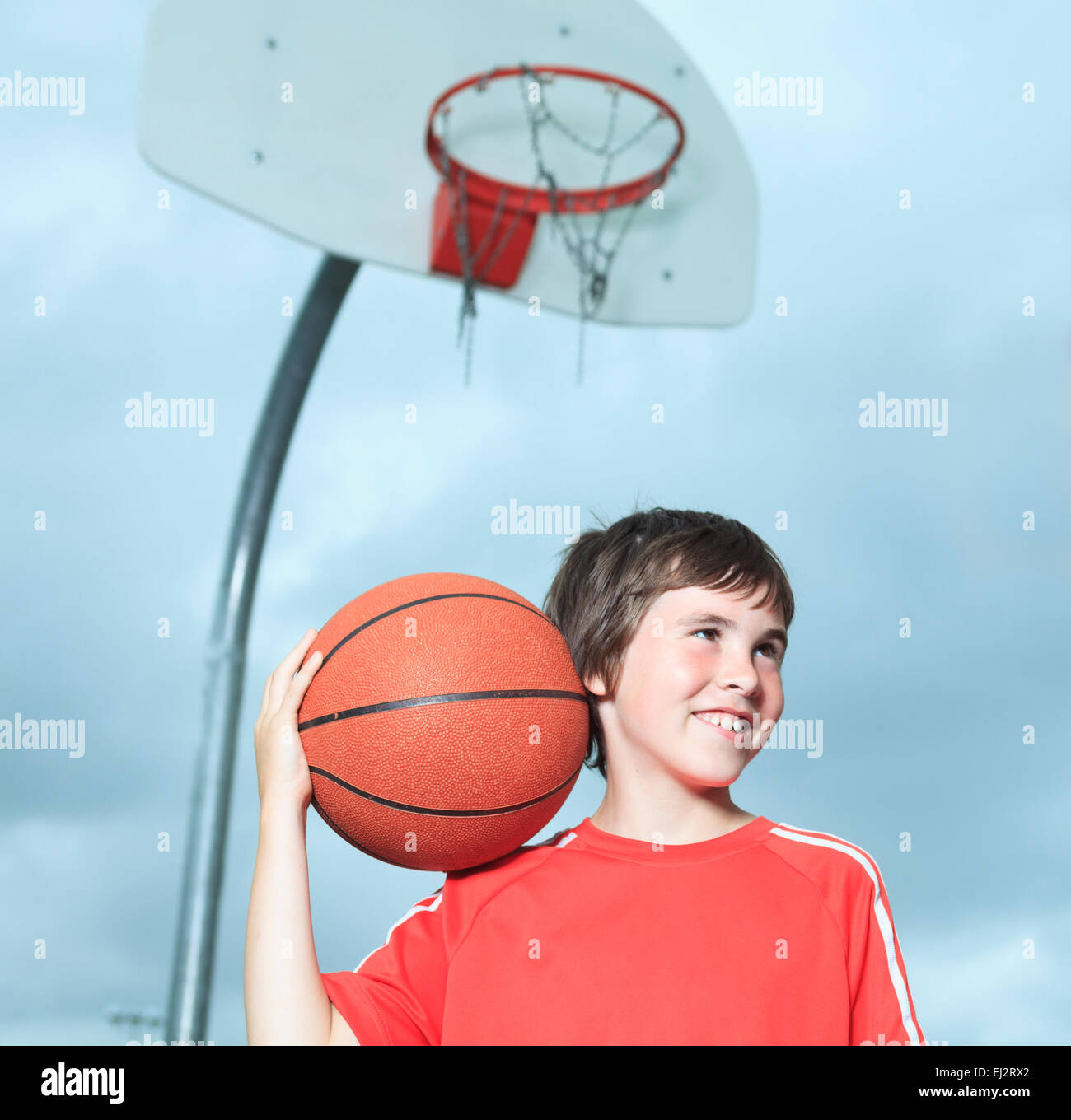 Young Boy In Basketball who having fun Stock Photo - Alamy
