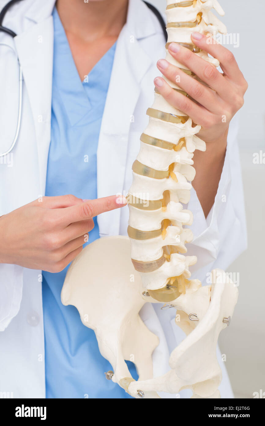 Female doctor examining spine hi-res stock photography and images - Alamy