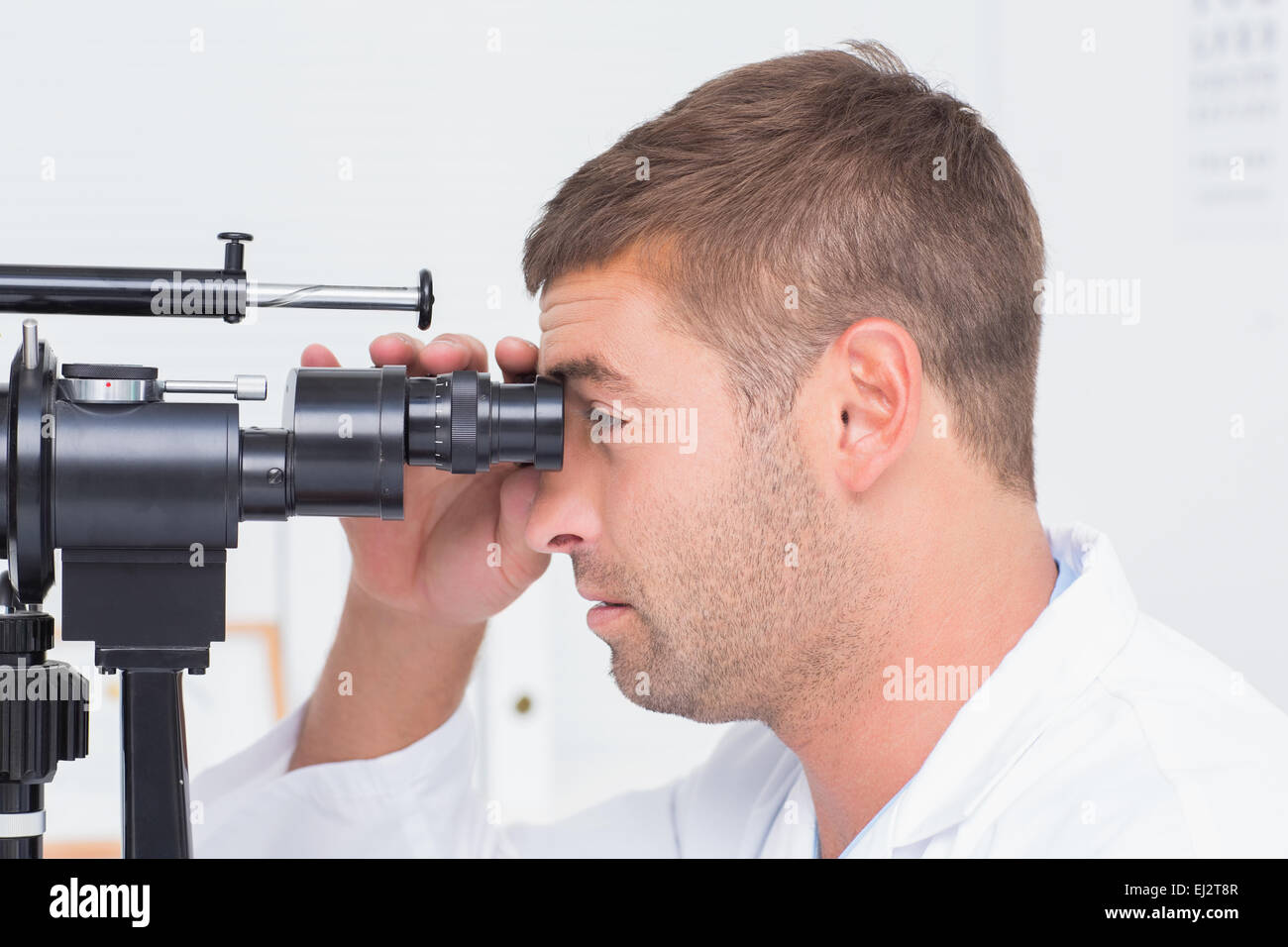 Eye examination using slit lamp hi-res stock photography and images - Alamy