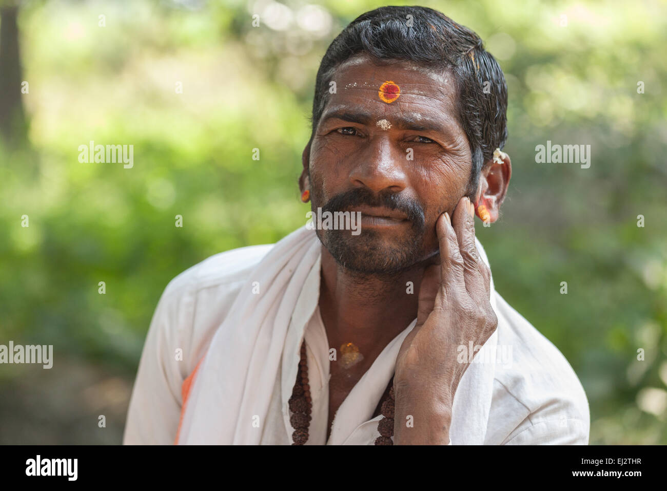 Portrait of a matured rural Indian person in traditional cloths & style ...