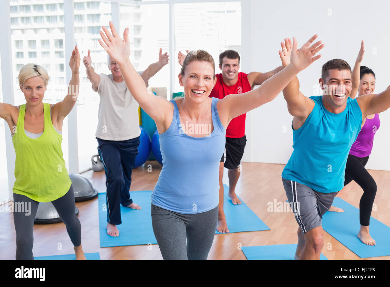 People exercising in gym class Stock Photo - Alamy