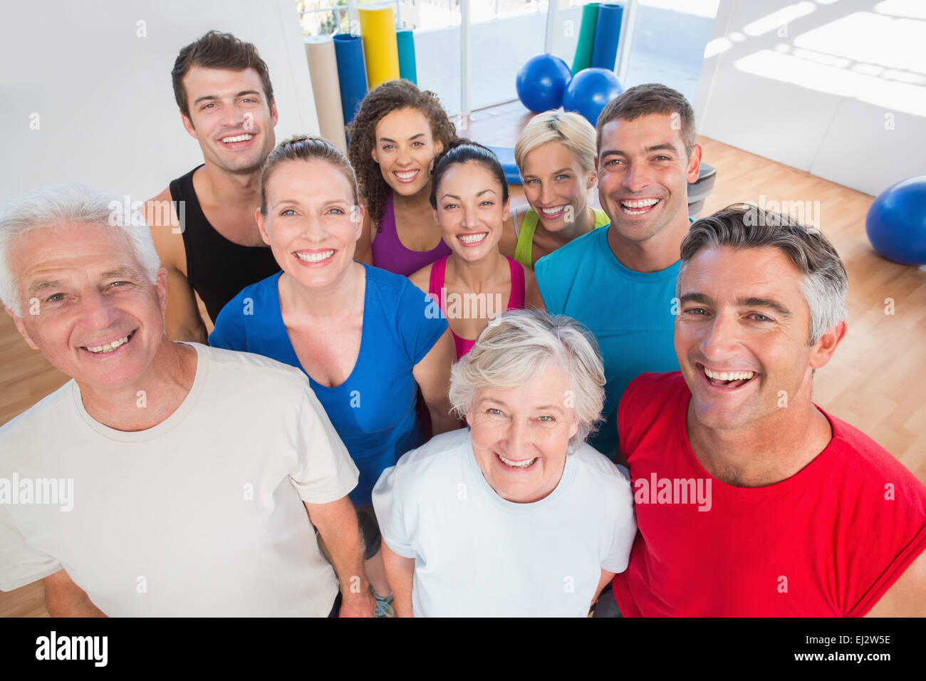 Happy people at gym Stock Photo - Alamy