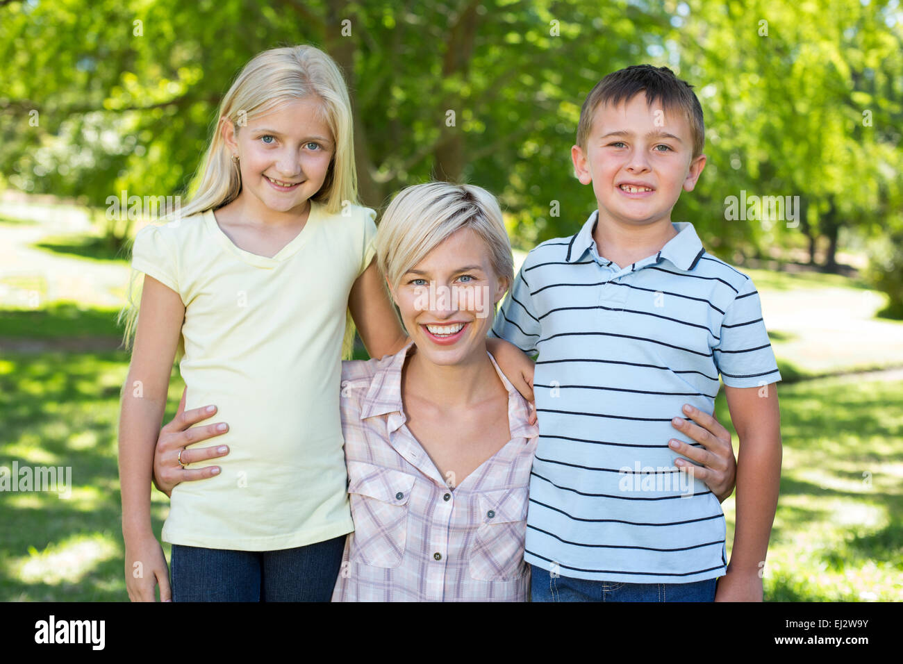 Pretty blonde with her children Stock Photo - Alamy
