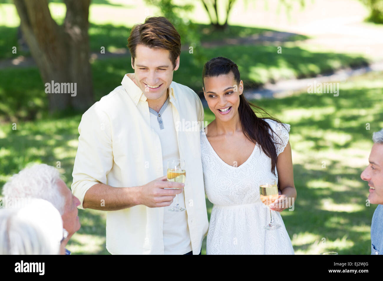 Happy couple smiling Stock Photo - Alamy