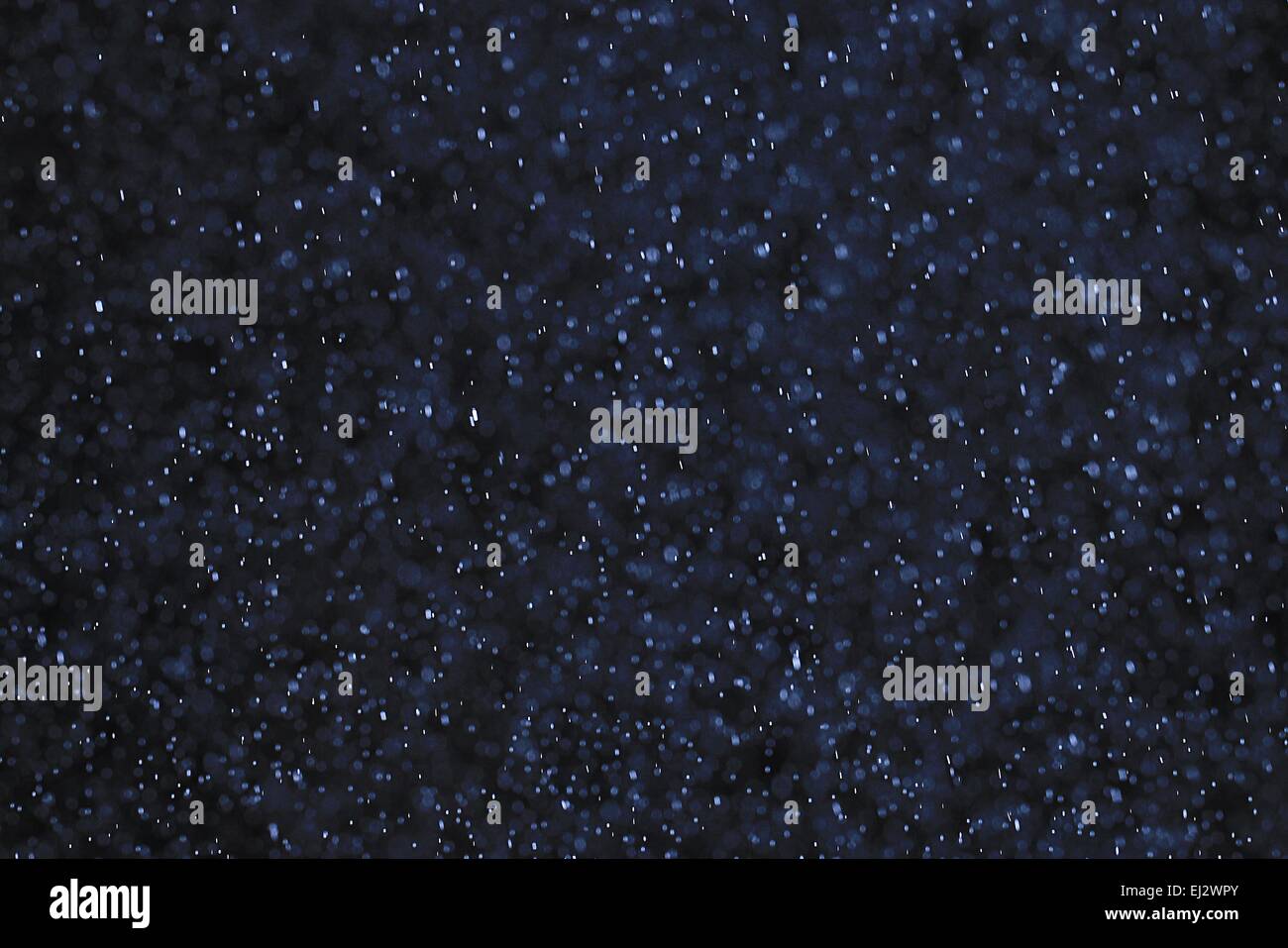 snow rain on a black background texture overlay Stock Photo - Alamy